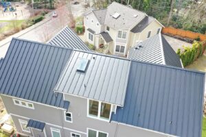 Before and After of New Metal Roof in Bellevue, Washington - Three Tree ...
